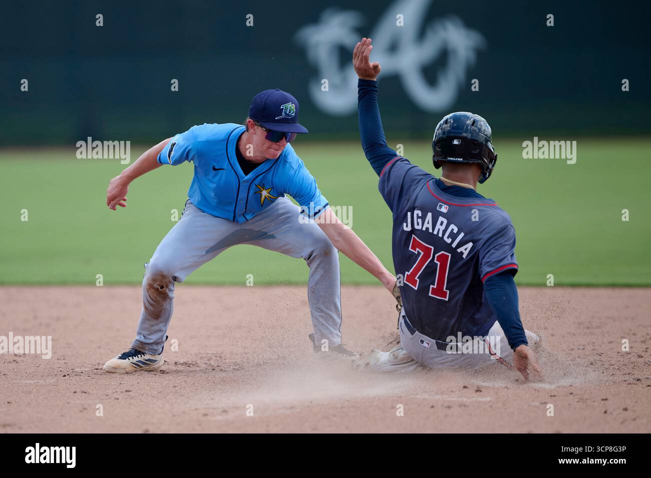 Tampa Bay Rays shortstop Cooper Flemming (11) tags Junior Garcia (71 ...