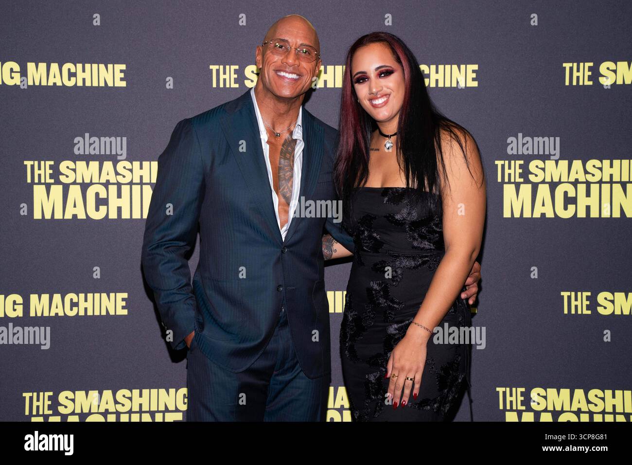 Dwayne Johnson, left, and Ava Raine pose for photographers upon arrival ...