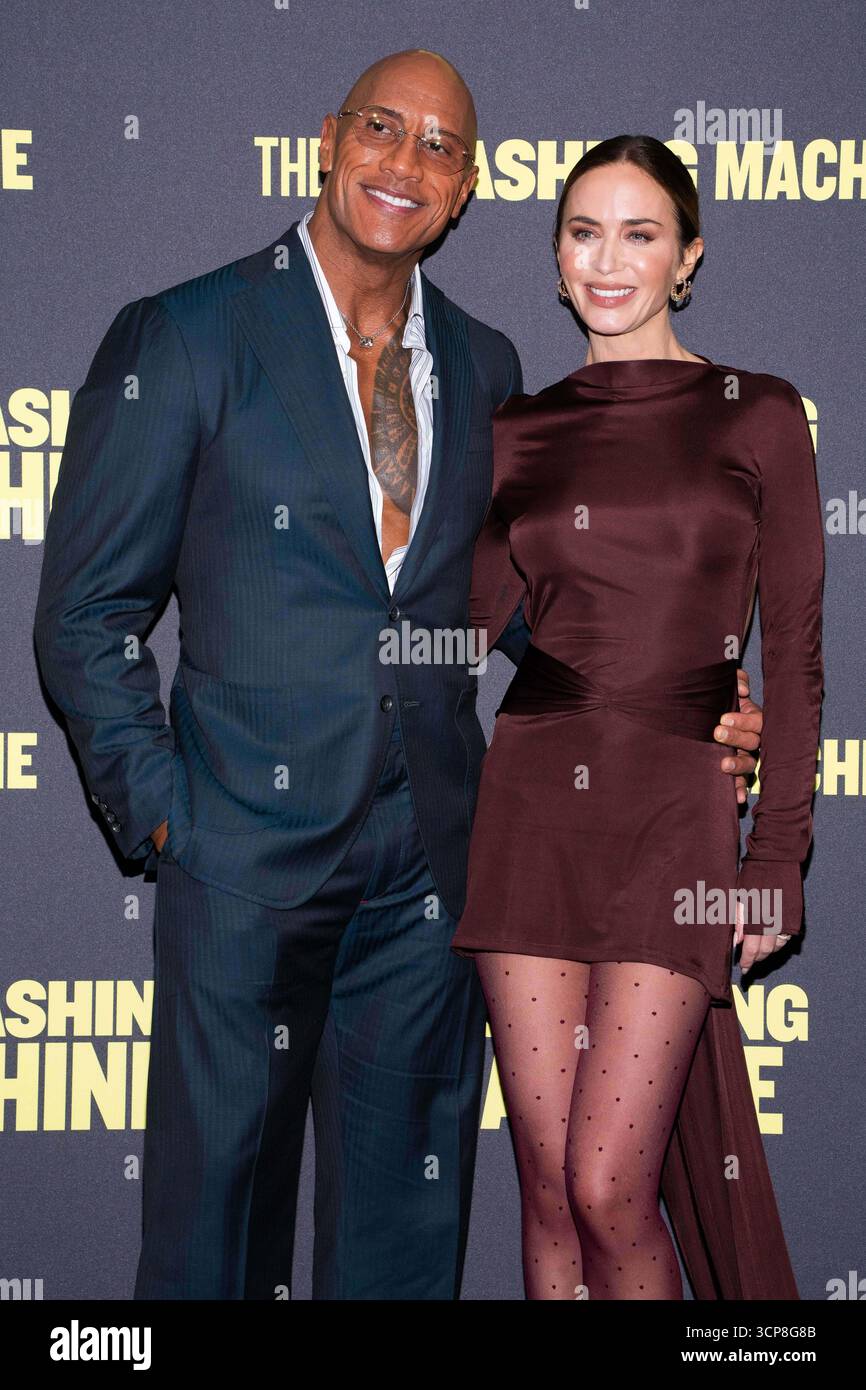 Dwayne Johnson, left, and Emily Blunt pose for photographers upon ...