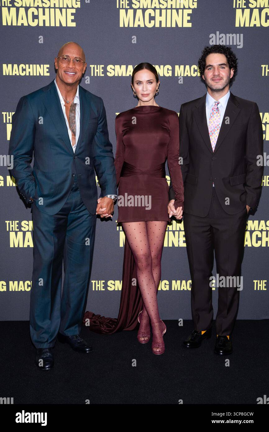 Dwayne Johnson, left, Emily Blunt and Benny Safdie pose for ...
