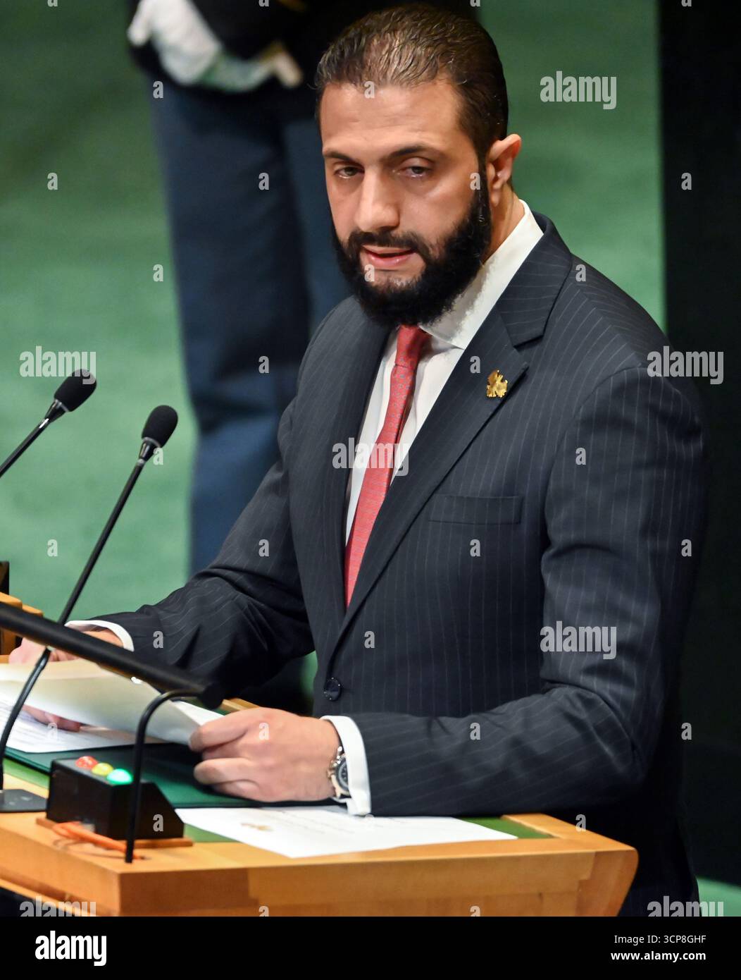 President Ahmad Al-Sharaa of the Syrian Arab Republic addresses the ...