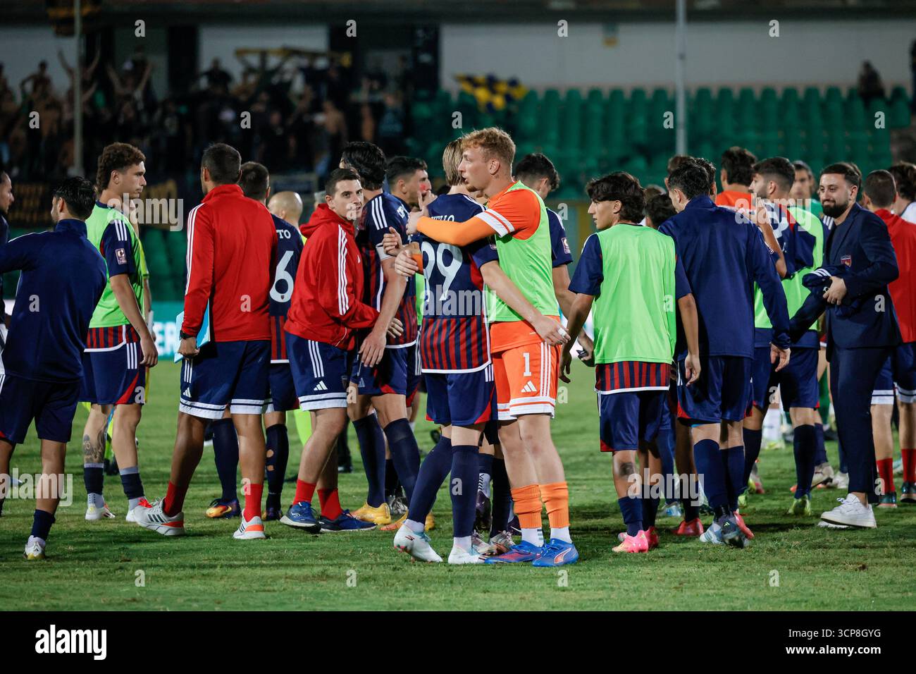 Cosenza players celebrate the victory at the end of the match during ...