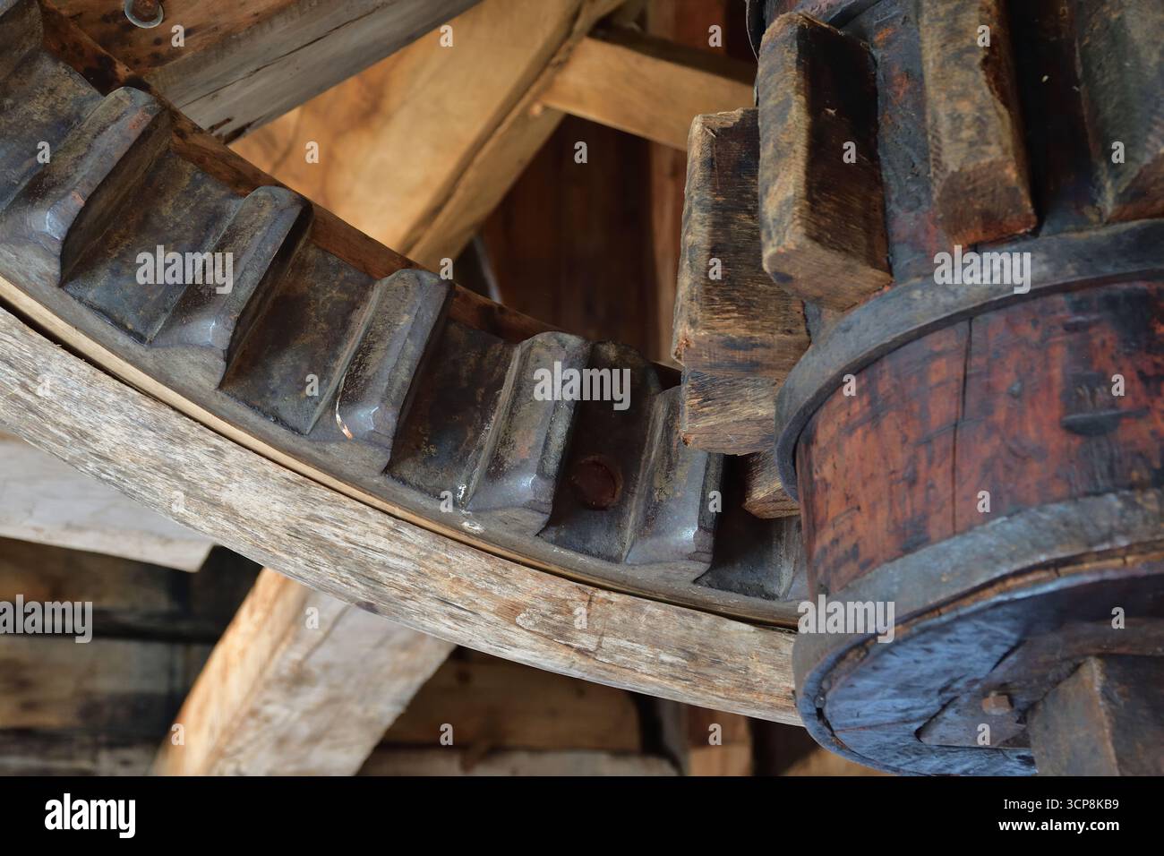 Vintage wooden gear. Mechanical bevel gear in a windmill. Power ...
