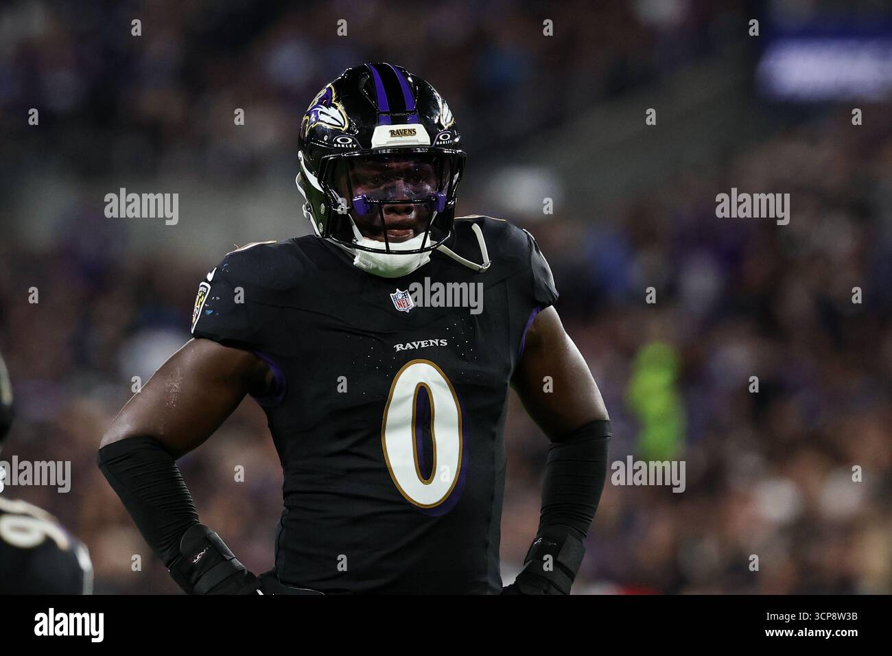 Baltimore Ravens linebacker Roquan Smith (0) looks on between plays ...