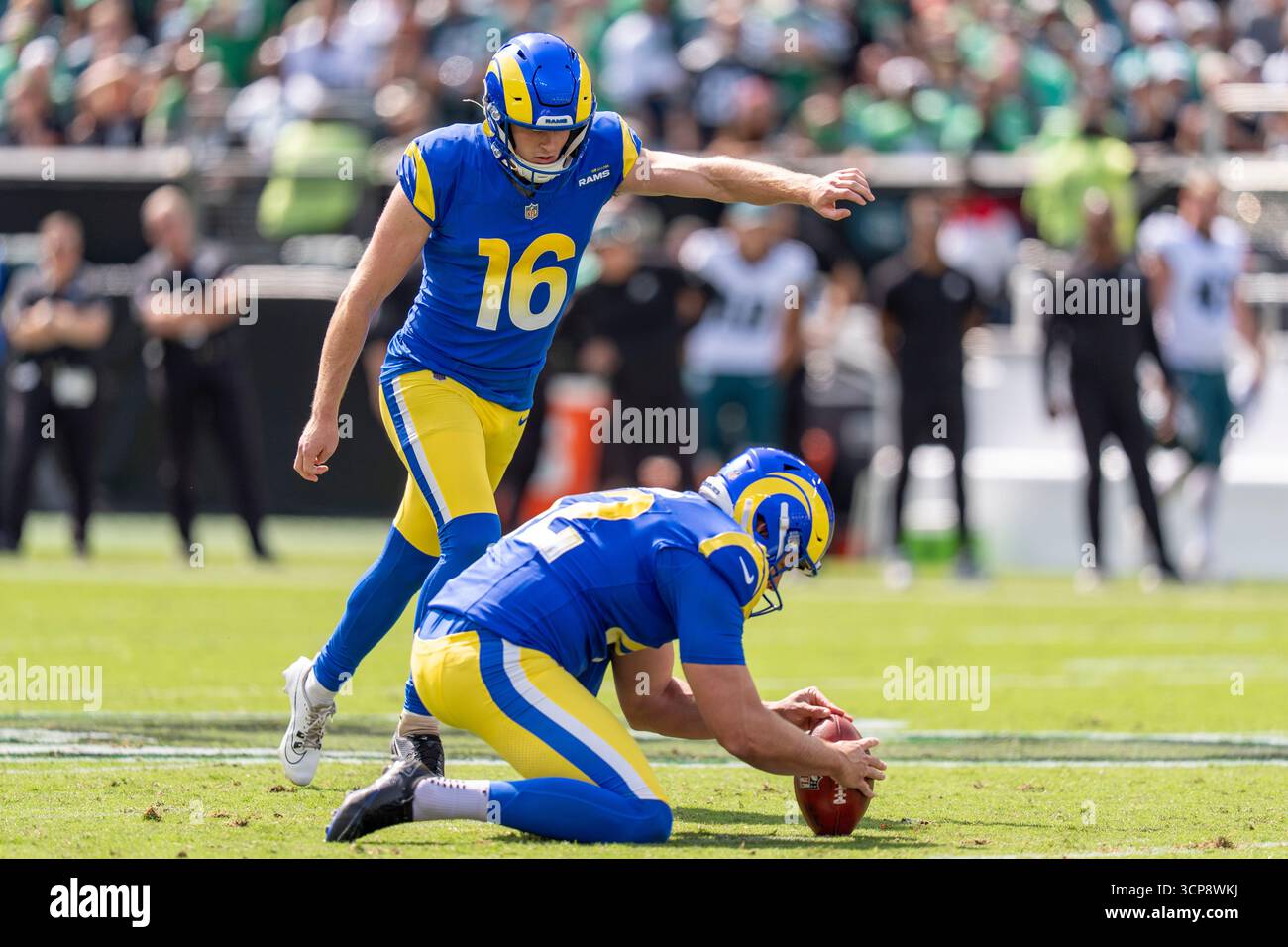 Los Angeles Rams kicker Joshua Karty, left, kicks the field goal with ...