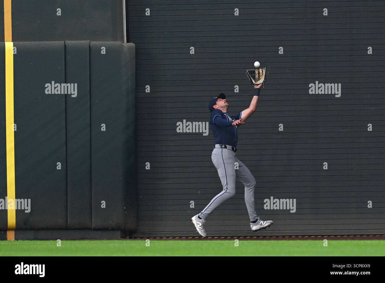 Tampa Bay Rays right fielder Josh Lowe catches a ball in foul territory ...