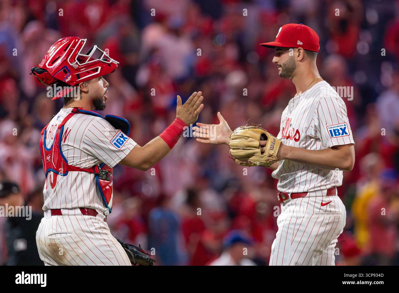 Philadelphia Phillies catcher Rafael Marchan, left, congratulates ...