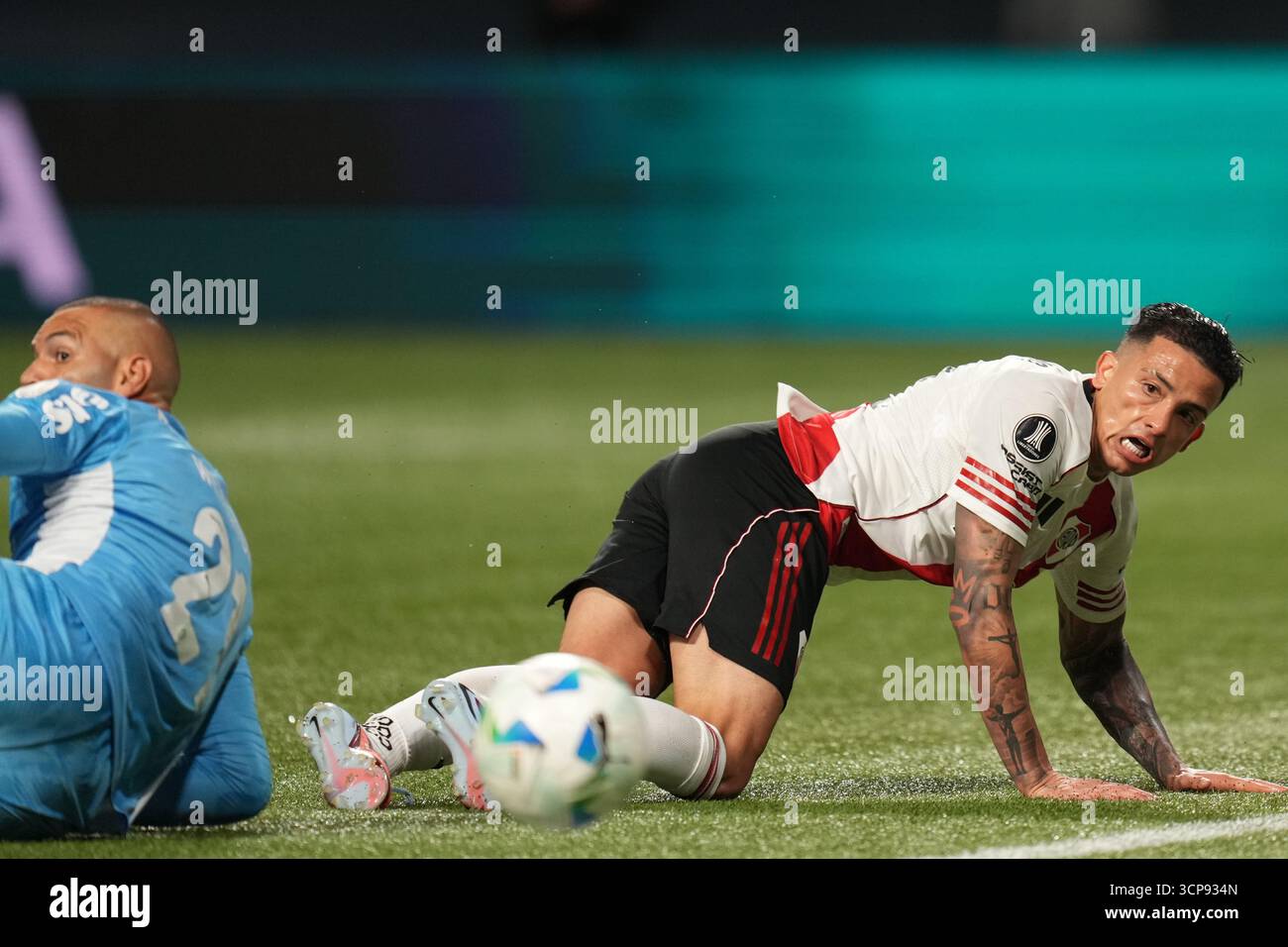 Kevin Castano of Argentina's River Plate, right, eyes the ball during a ...