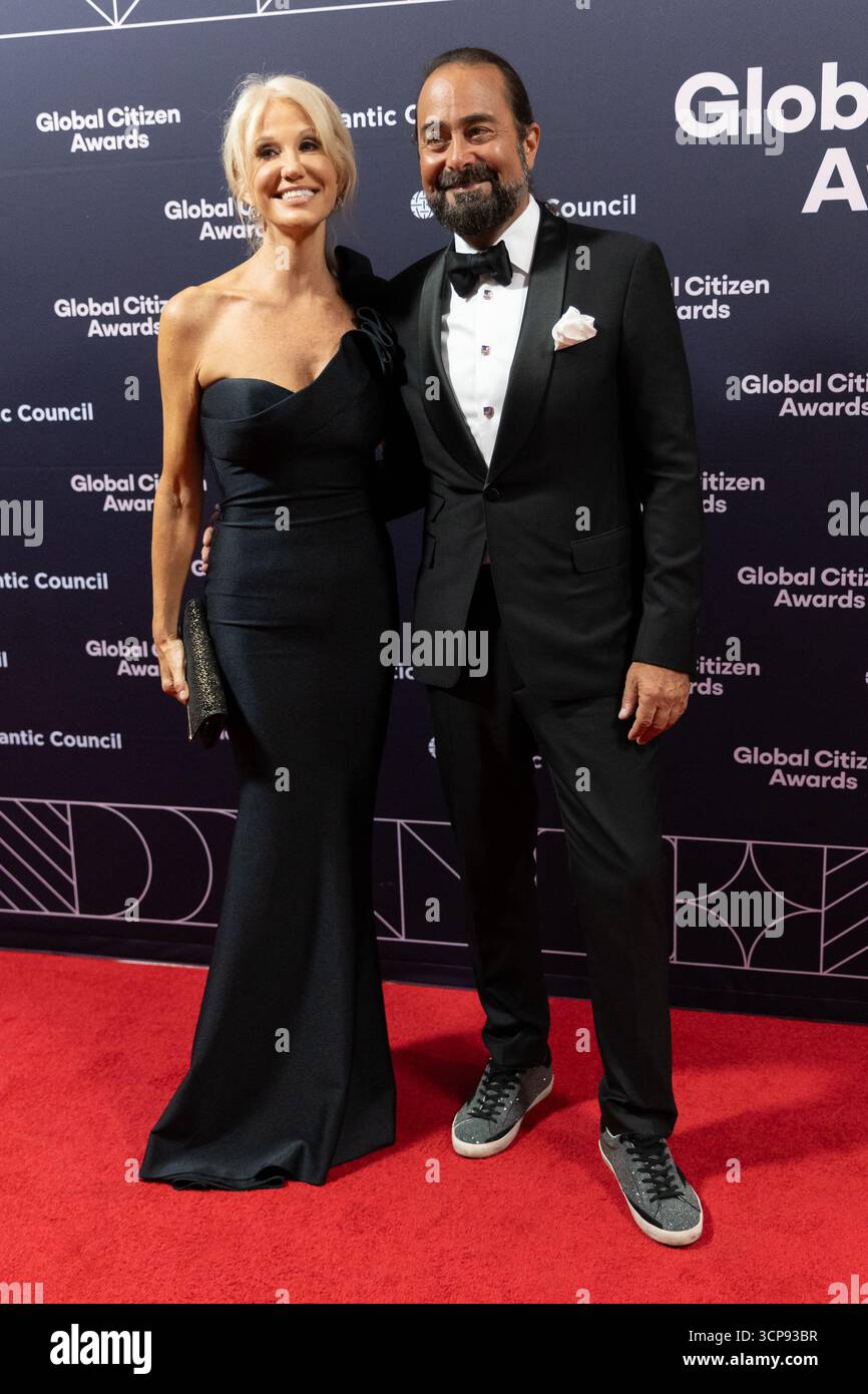 Kellyanne Conway, left, and David Zervos arrive at the Global Citizen ...