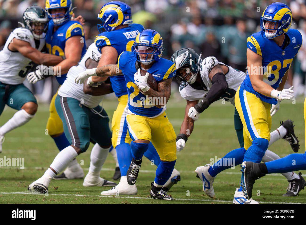 Los Angeles Rams running back Blake Corum, center, runs with the ball ...