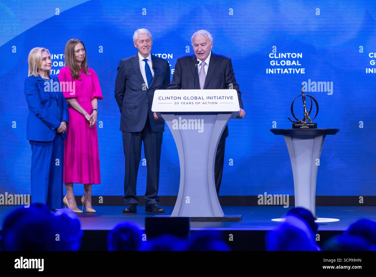 Tom Golisano receives an award from former President Bill Clinton ...