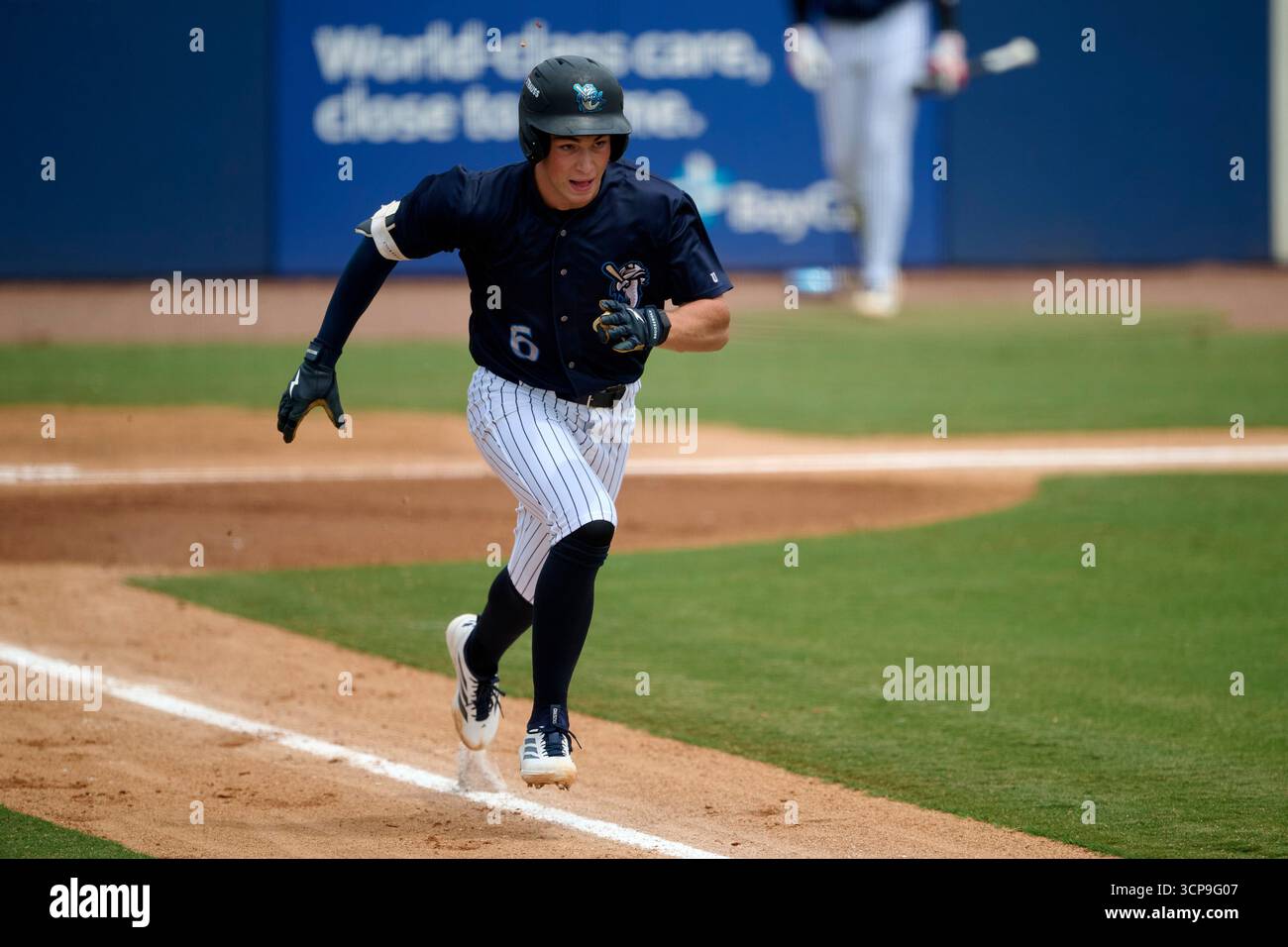 Tampa Tarpons Dax Kilby (6) runs to first base during an MiLB Florida ...