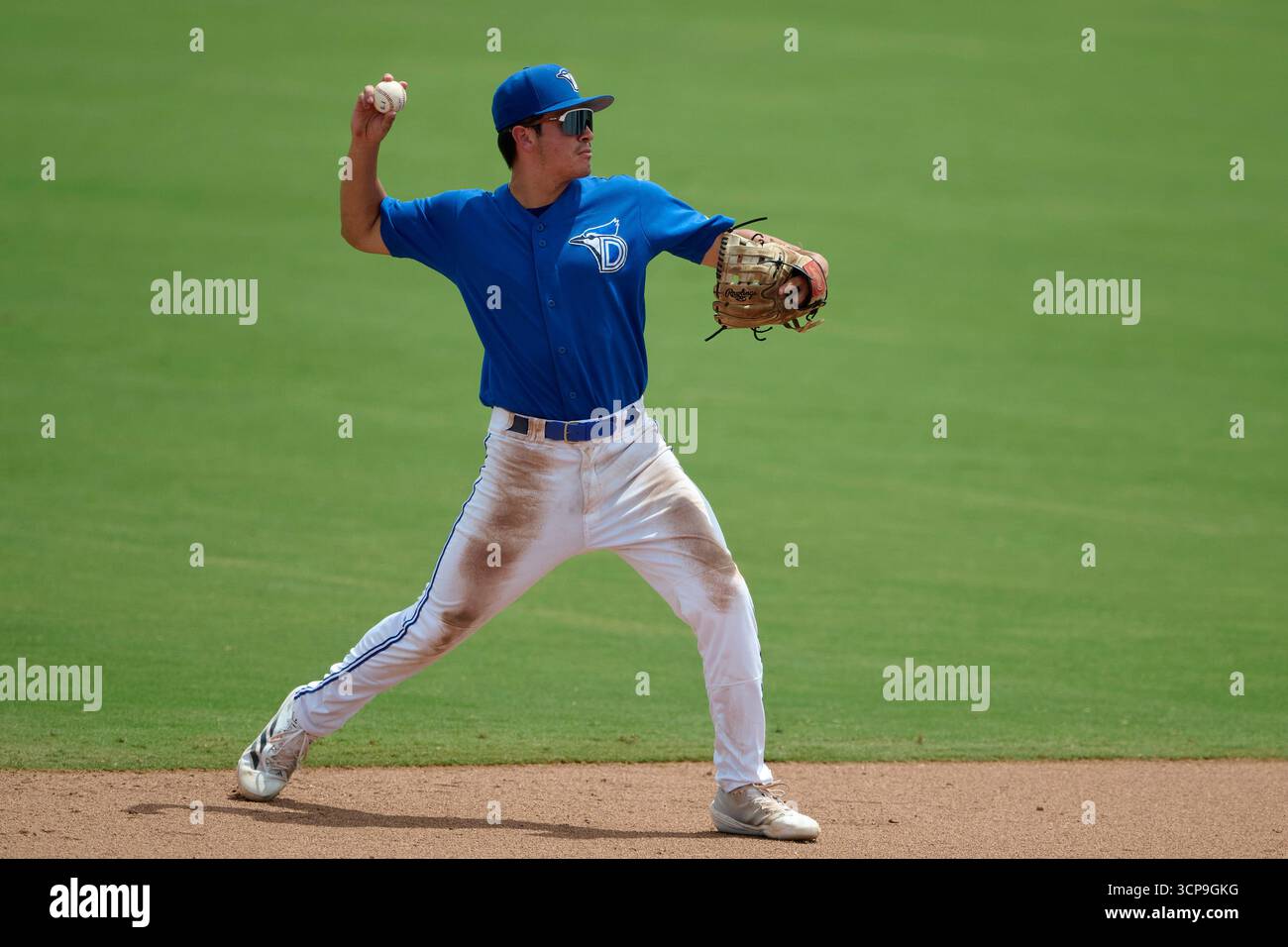 Dunedin Blue Jays second baseman Maddox Latta (19) throws to first base ...