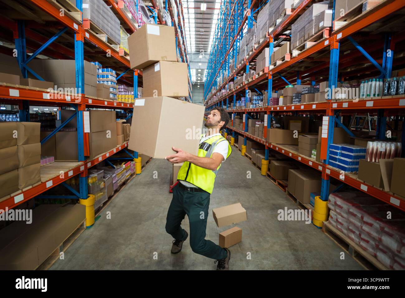 Woman managing logistics in aisle hi-res stock photography and images ...