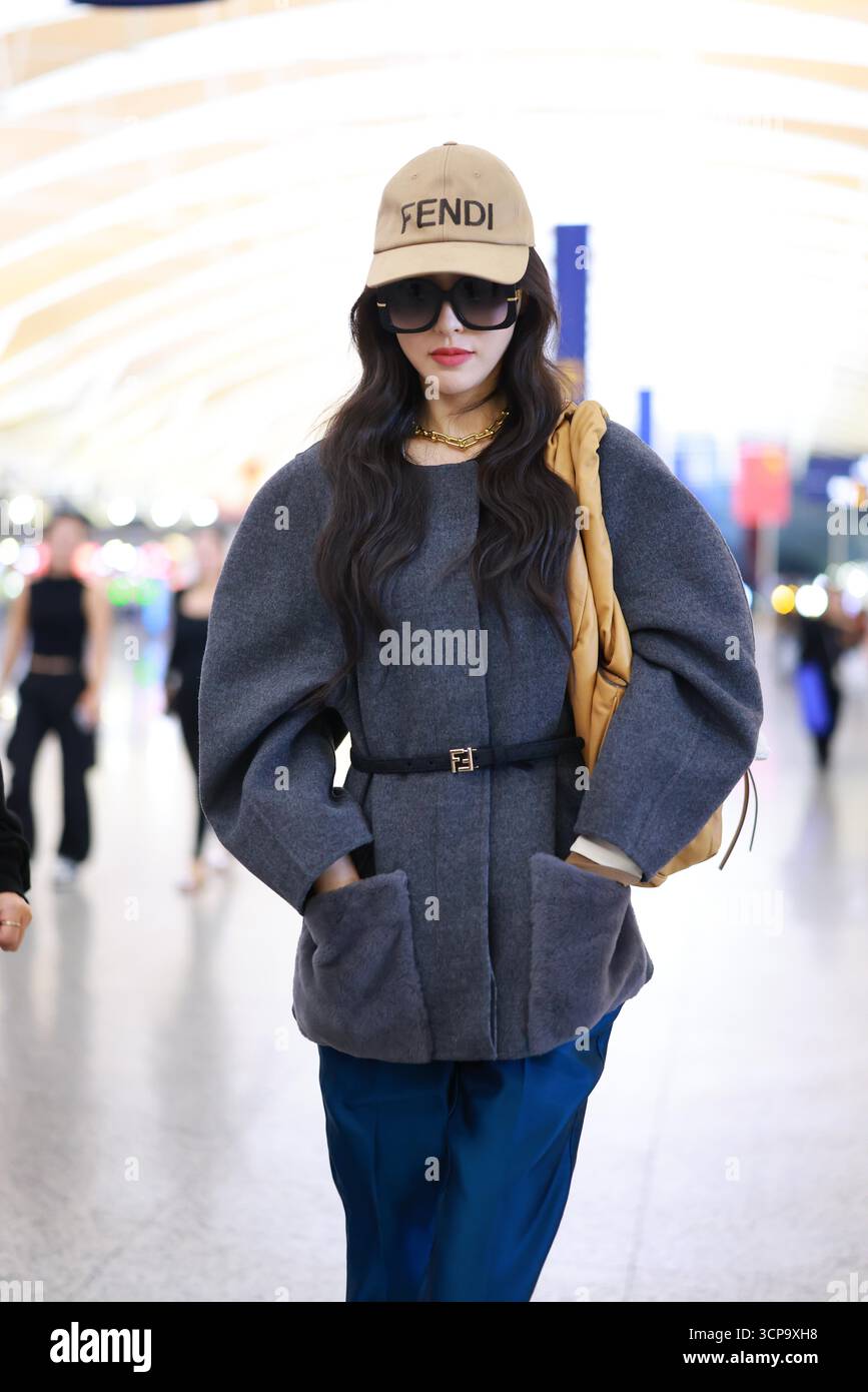 Chinese actress and singer Tiffany Tang appears at the airport in ...