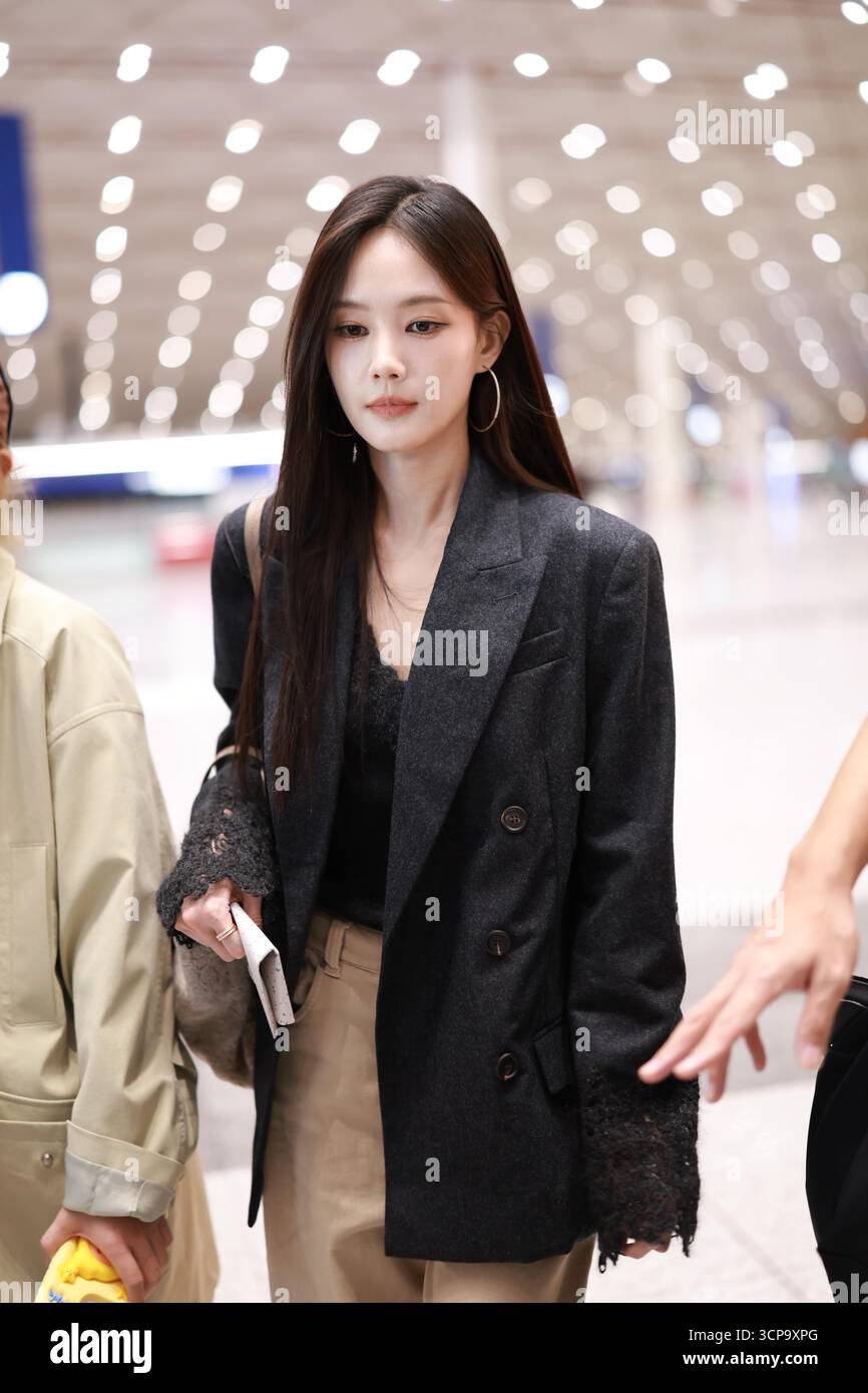 Chinese actress and singer Li Yitong appears at the airport in Beijing ...