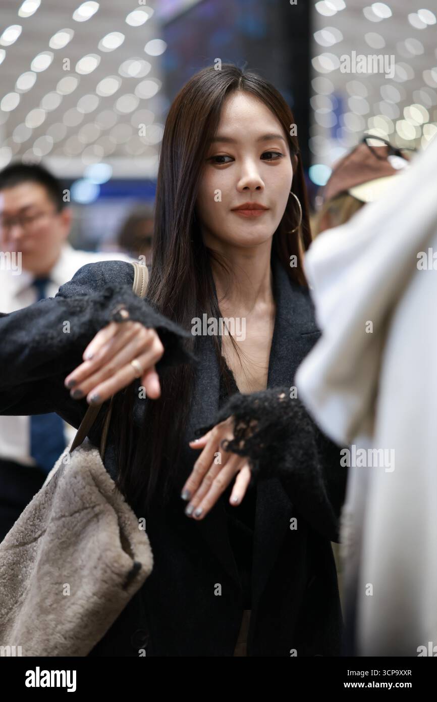 Chinese actress and singer Li Yitong appears at the airport in Beijing ...