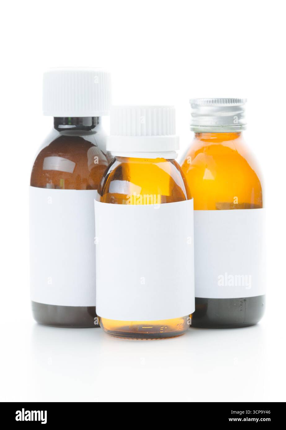 Bottles of medicinal liquids grouped on a white background showcasing ...