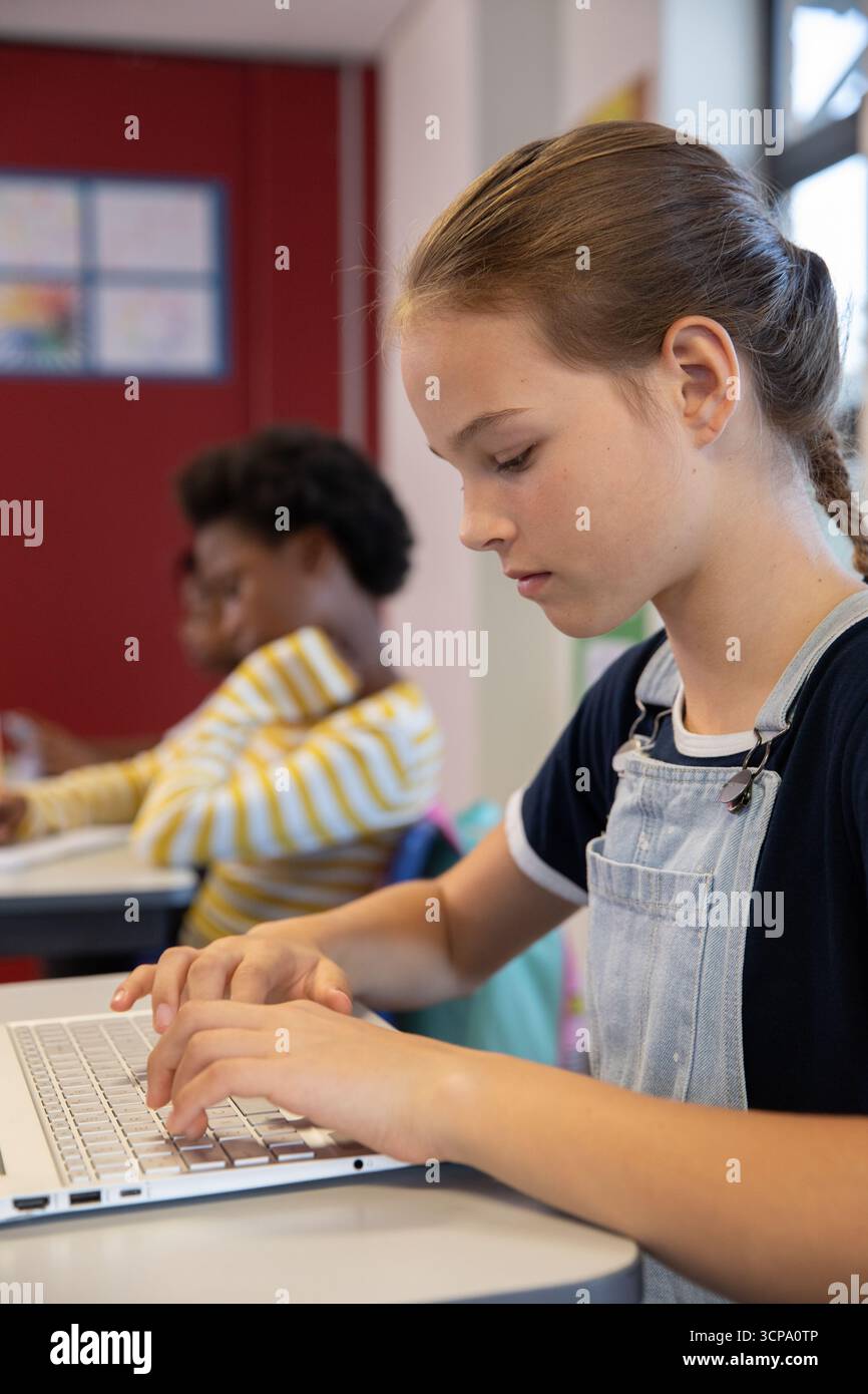 Children work on laptops in hi-res stock photography and images - Alamy