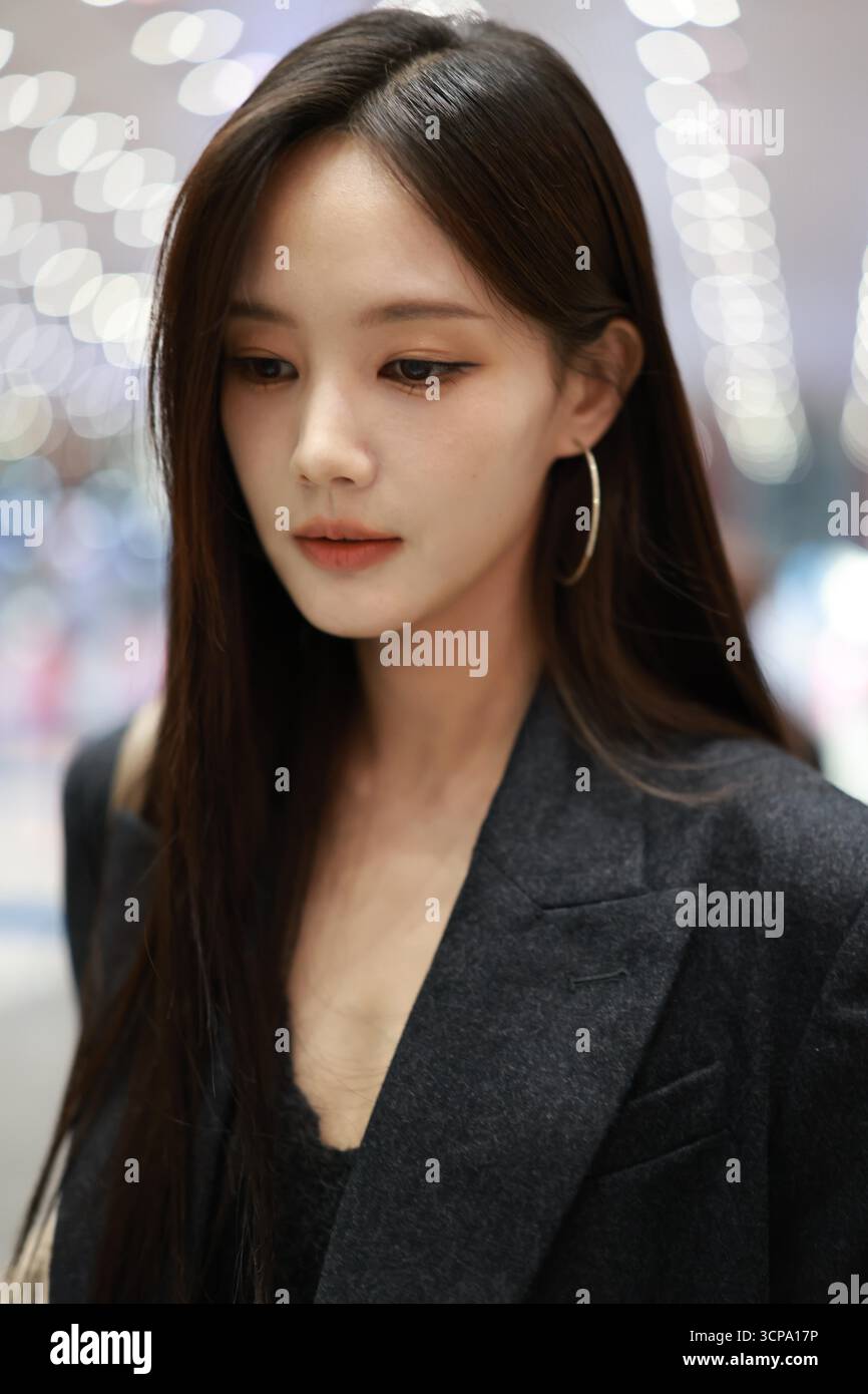 Chinese actress and singer Li Yitong appears at the airport in Beijing ...