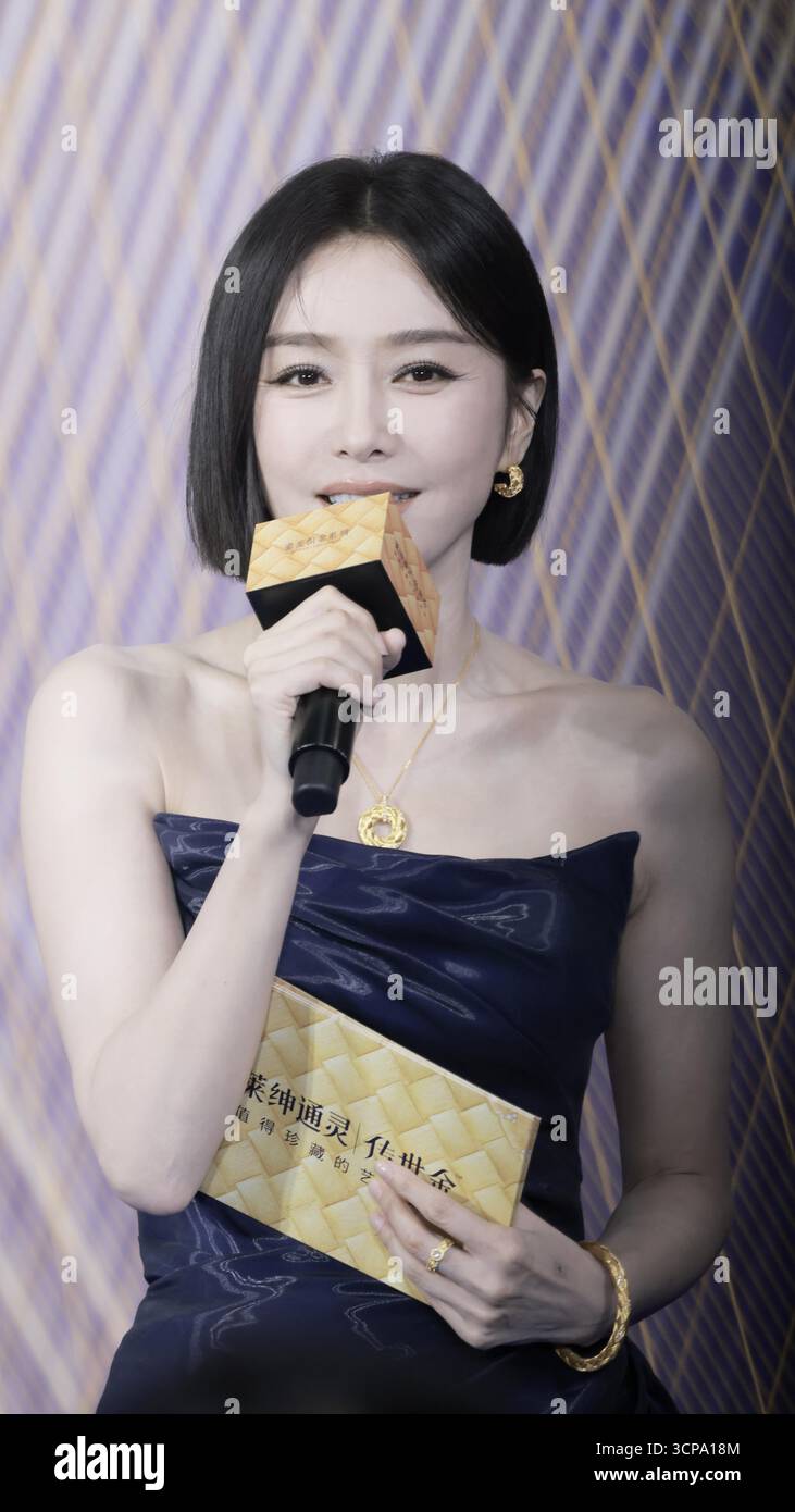 Chinese actress, model, and singer Qin Lan attends an activity in Wuxi ...