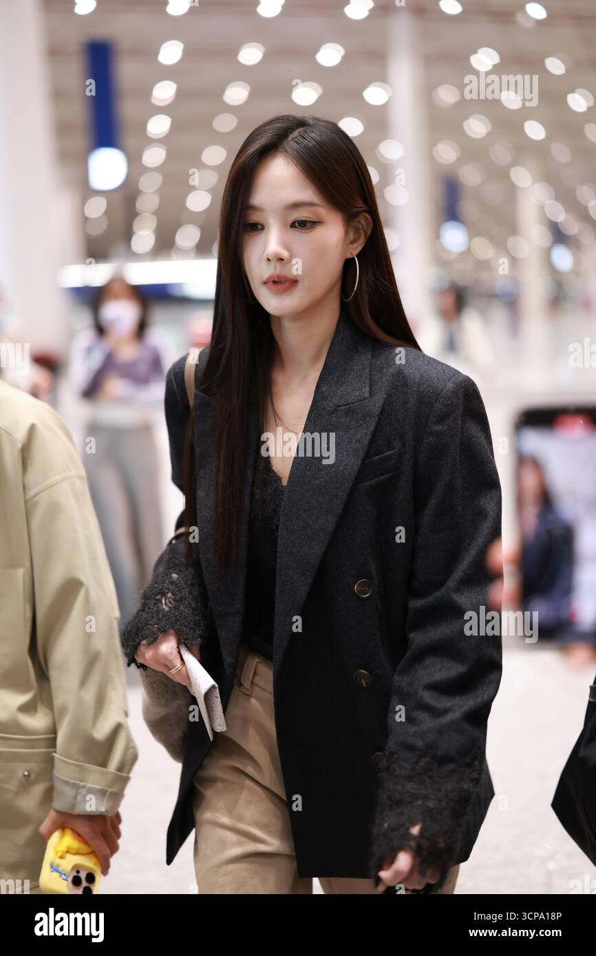 Chinese actress and singer Li Yitong appears at the airport in Beijing ...
