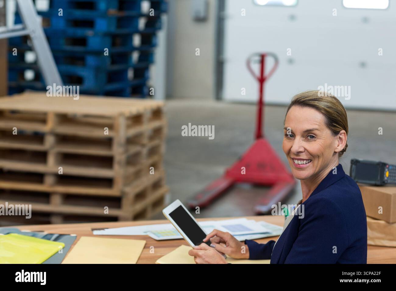 Warehouse supervisor sitting desk hi-res stock photography and images ...