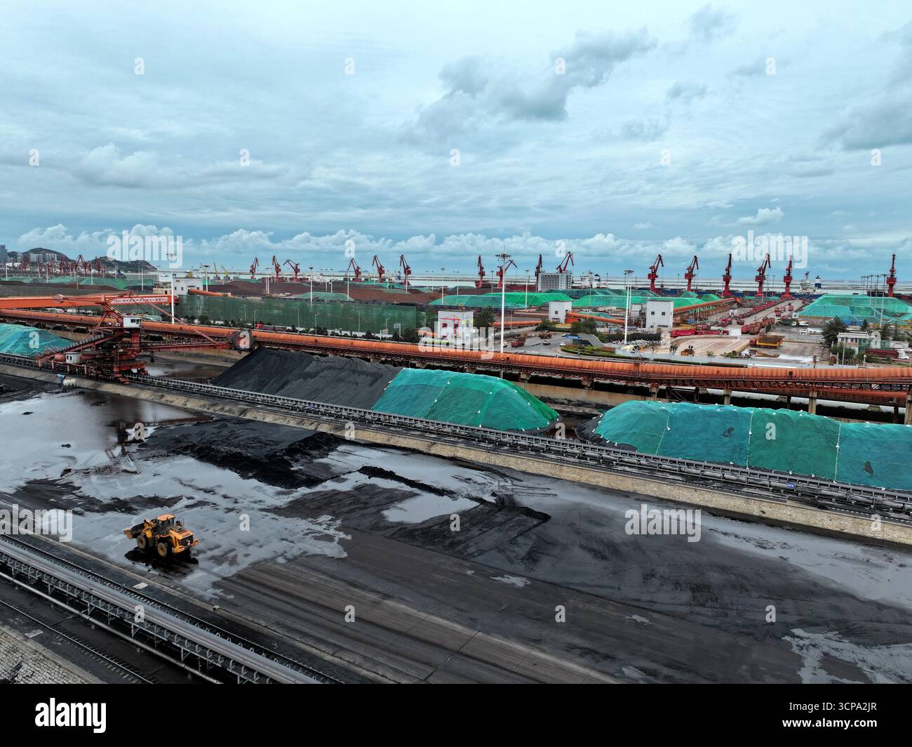 Aerial photo shows the ship unloading coals at Lianyungang Port in ...