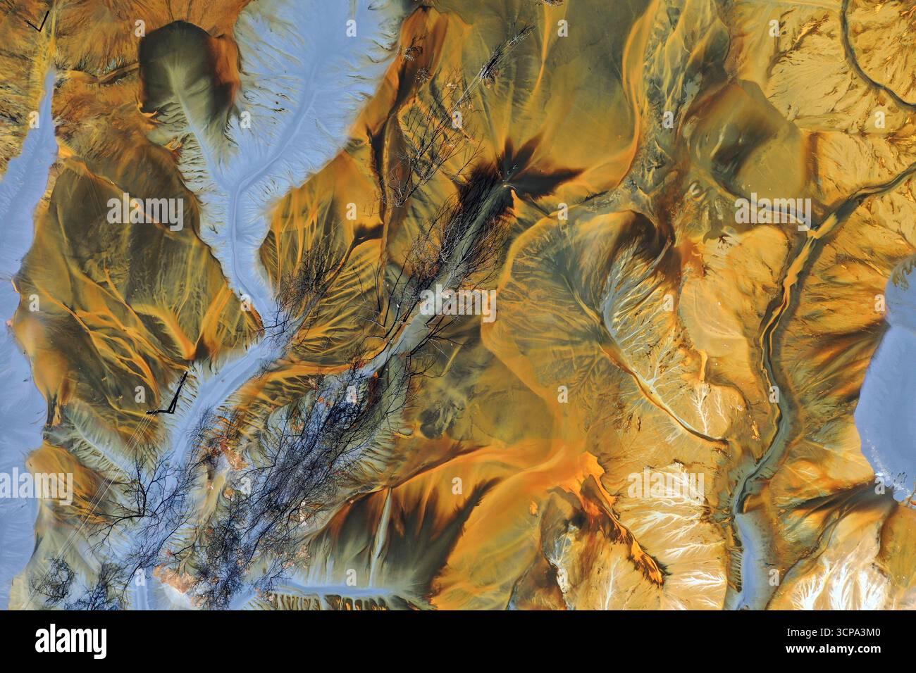 Aerial view of surreal natural patterns of gold cyanide leaching ...