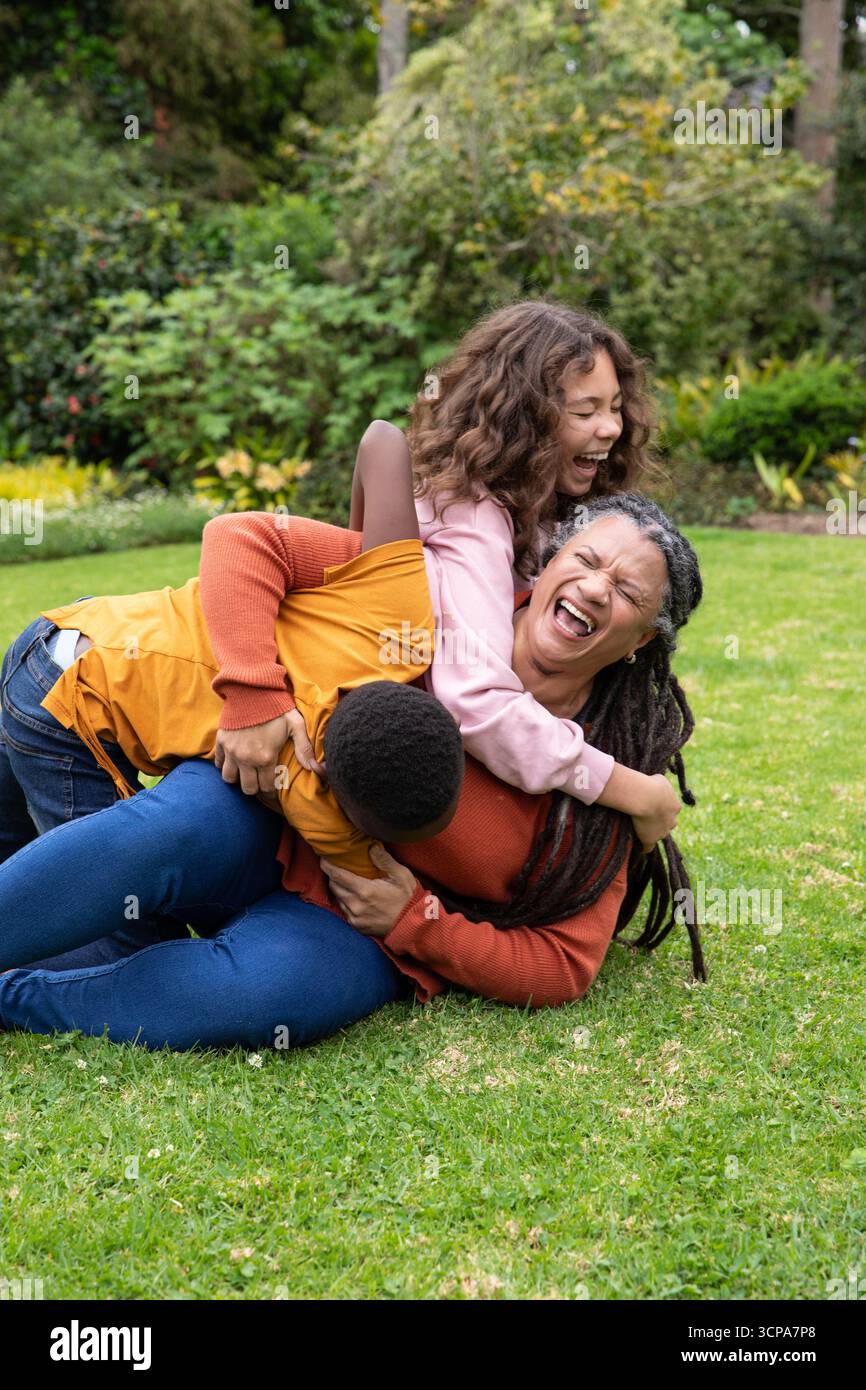 Family laughing hugging in hi-res stock photography and images - Alamy