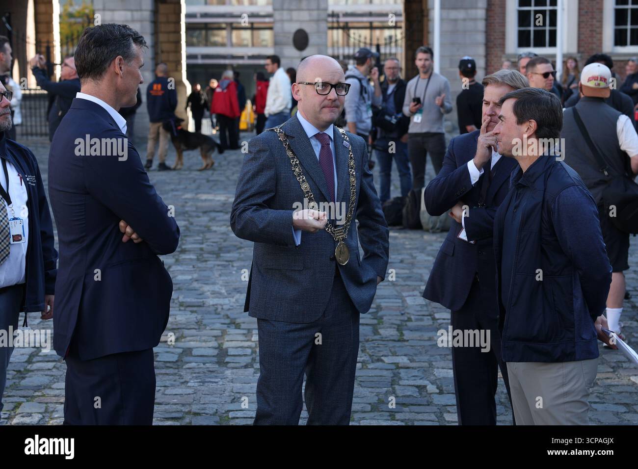 Ray McAdam, Lord Mayor of Dublin, center, speaks with Henry Hodgson ...