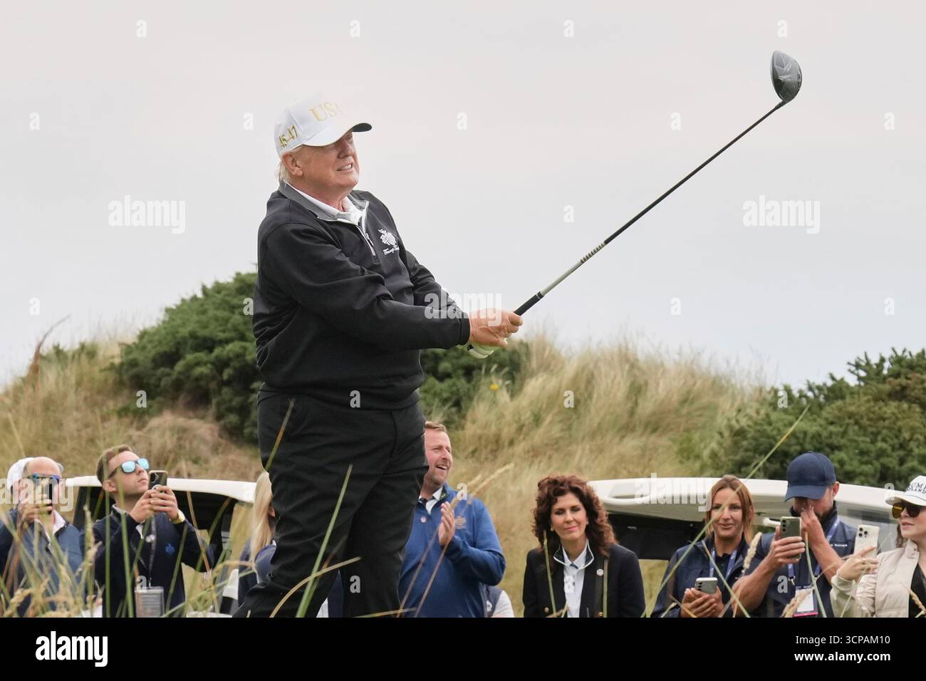 FILE - President Donald Trump tees off during the opening ceremony for ...