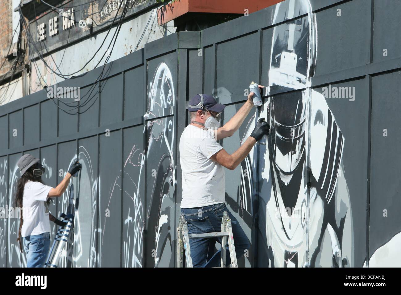 Dublin, Ireland - 23rd September 2025 - Spray artists work on a large ...