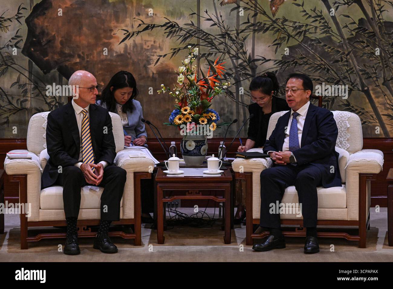 U.S. Representative Adam Smith, left, speaks with Shanghai Mayor Gong ...