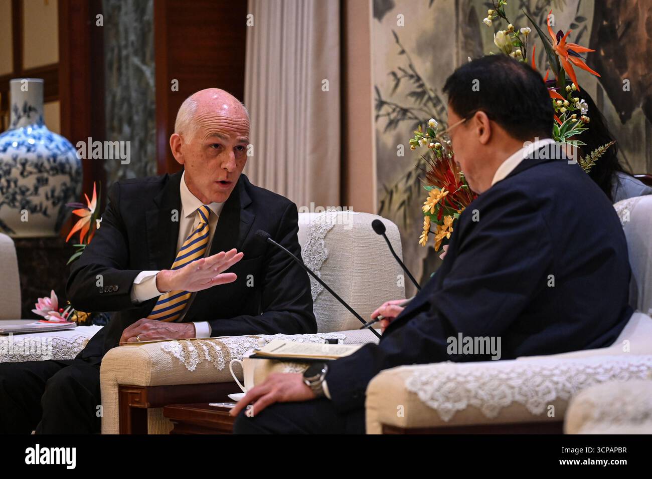 U.S. Representative Adam Smith, left, speaks with Shanghai Mayor Gong ...