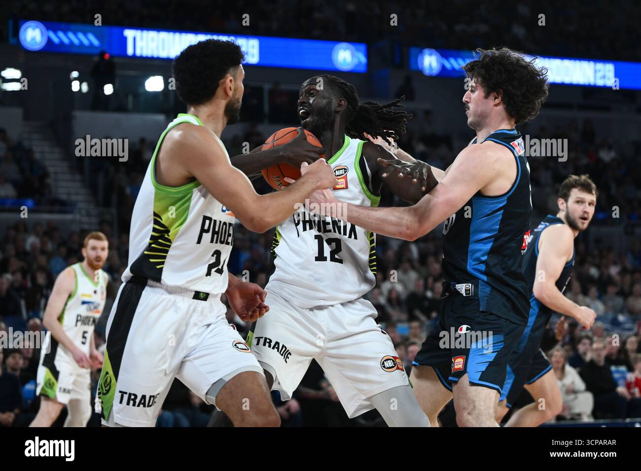 Gorjok Gak of the Phoenix (centre) during the NBL Round 2 match between ...