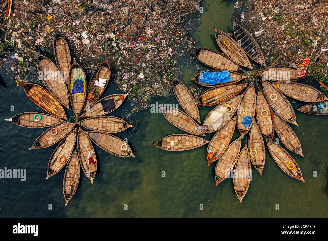 Aerial view of boats clustered together in a flower-like pattern on the ...