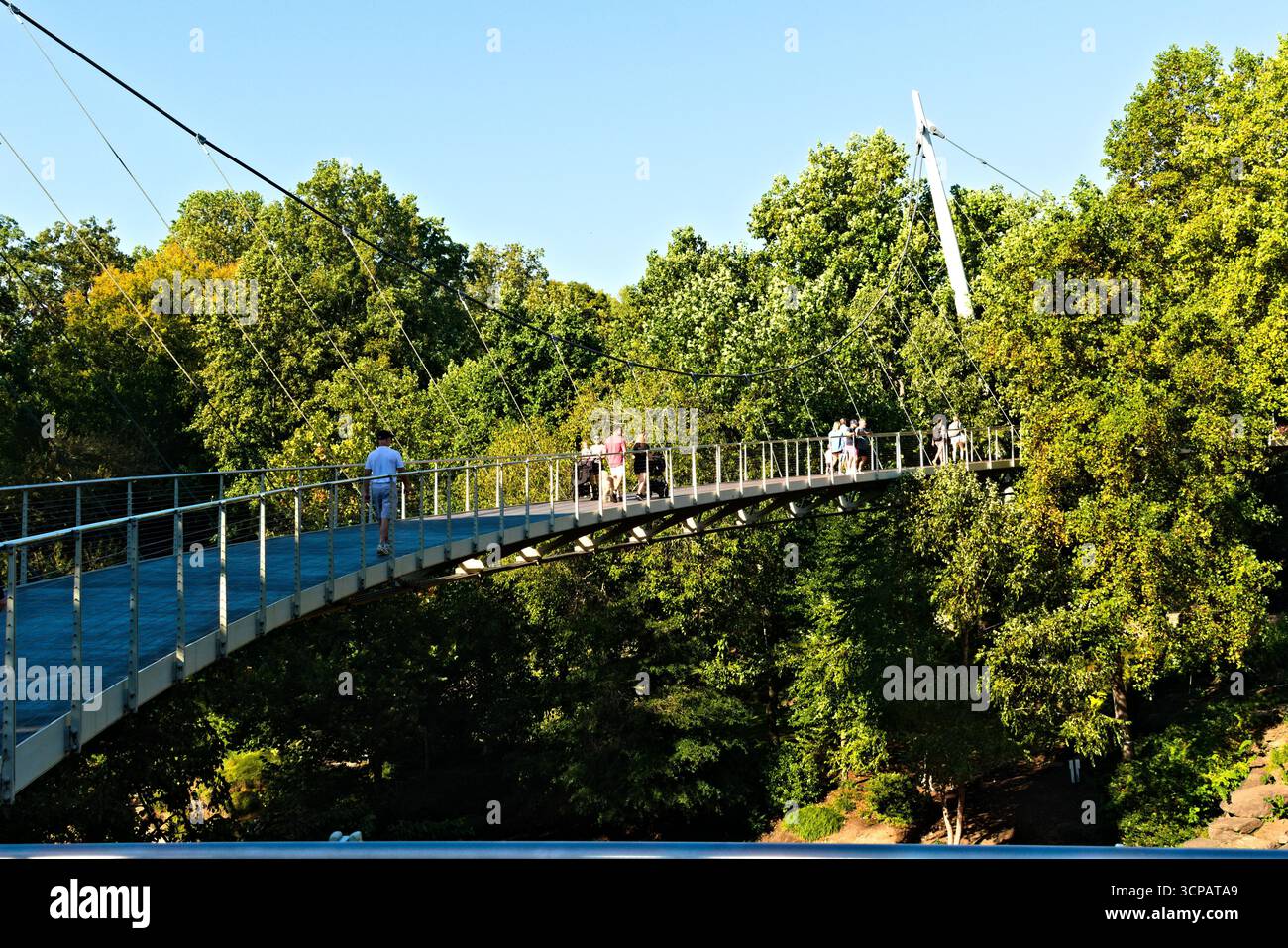 Greenville, SC – September 13, 2025: The beautiful Liberty Bridge, located in the Falls Park on ...