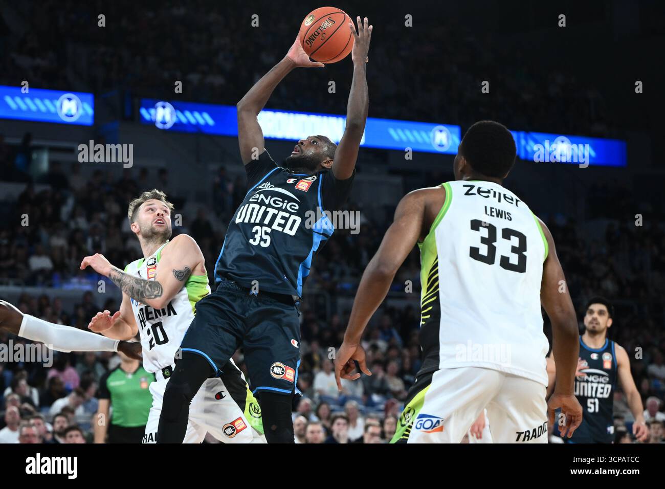 Milton Doyle of Melbourne United (centre) during the NBL Round 2 match ...