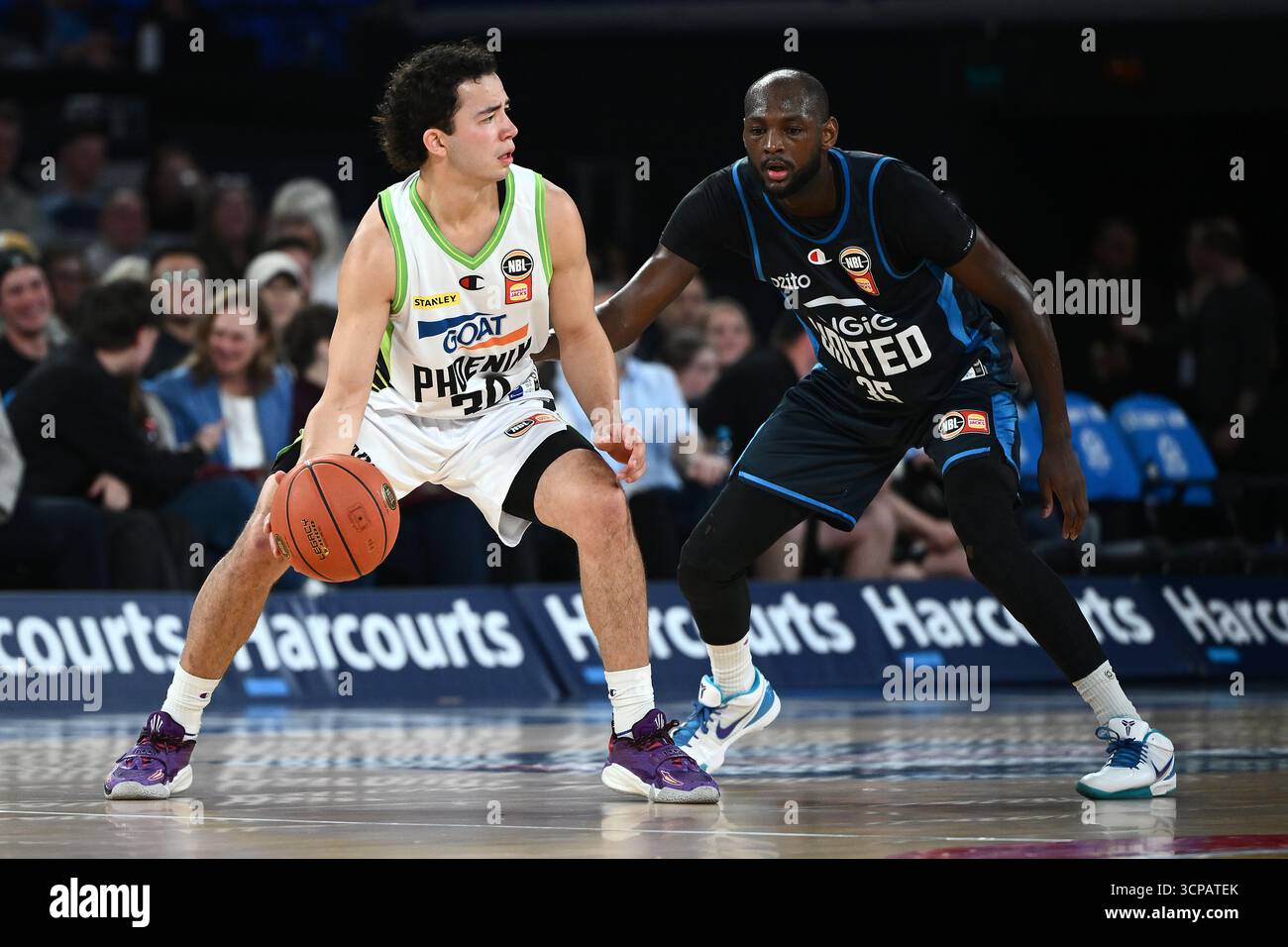 Owen Foxwell of the Phoenix (left) and Milton Doyle of Melbourne United ...
