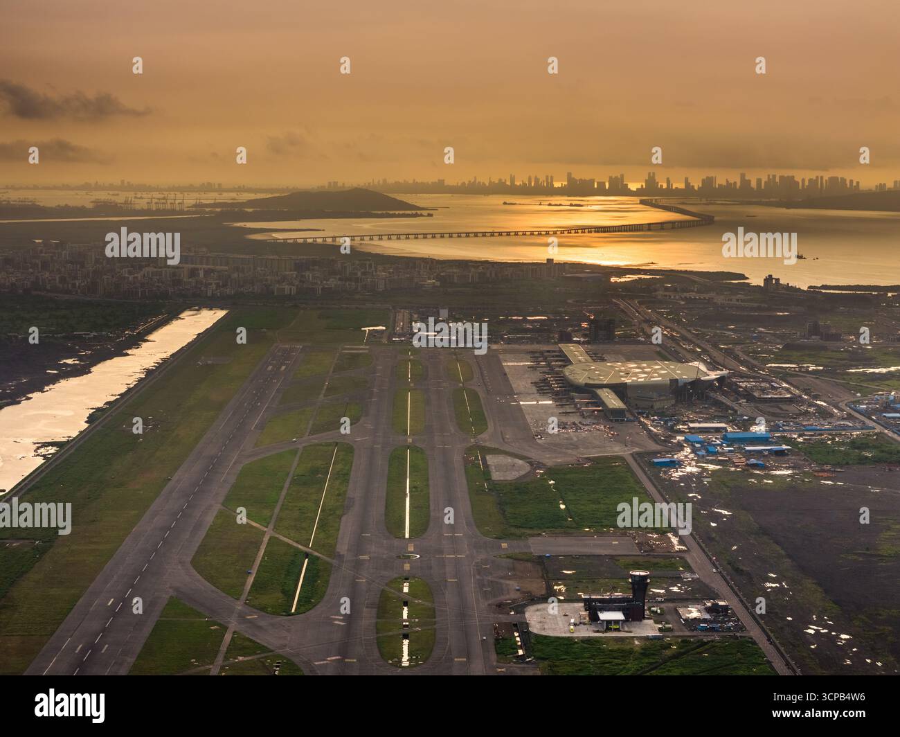 Aerial view of the Navi Mumbai International Airport glimmers under the ...