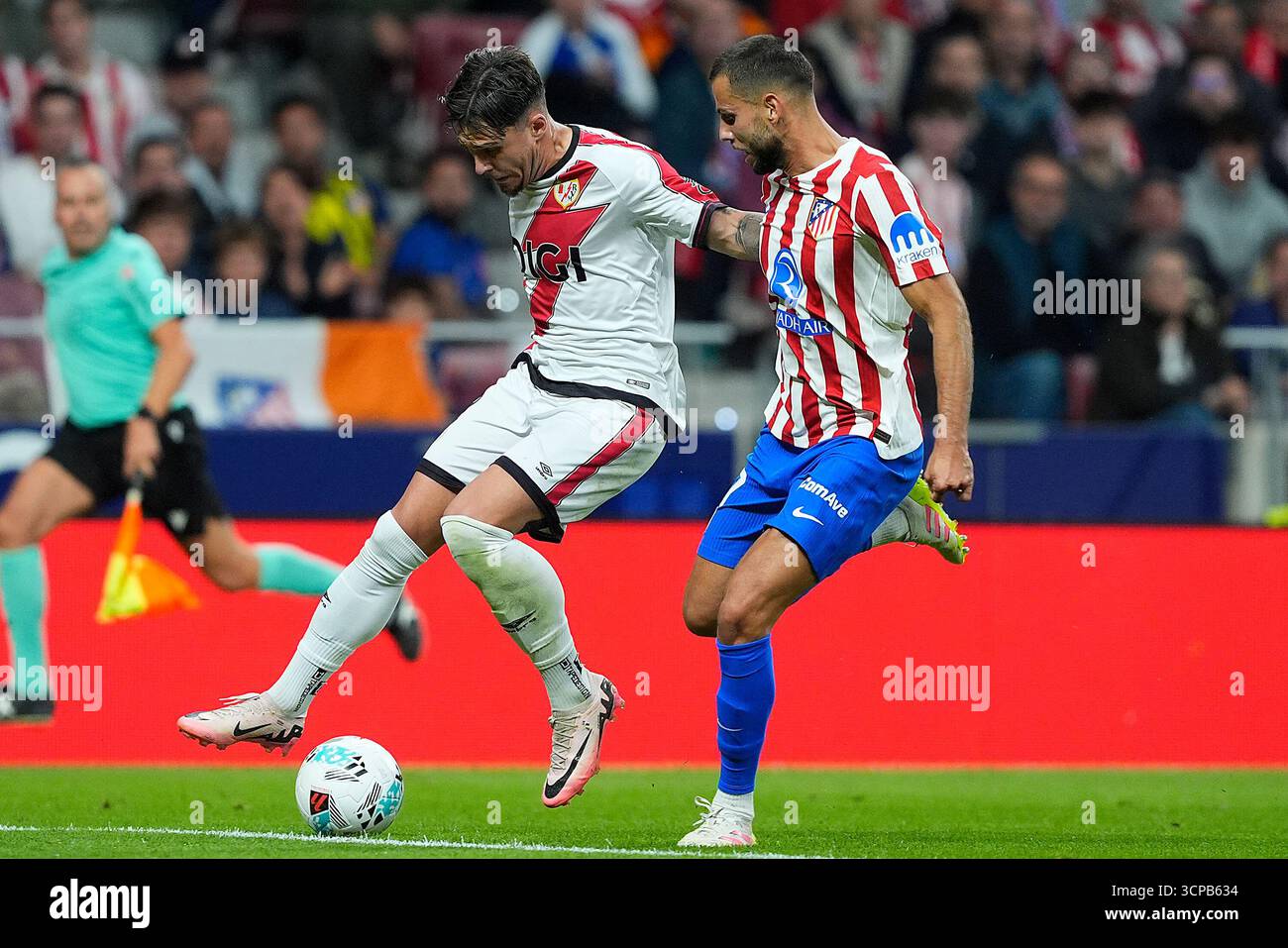 Atletico de Madrid's David Hancko (r) and Rayo Vallecano's Andrei Ratiu ...