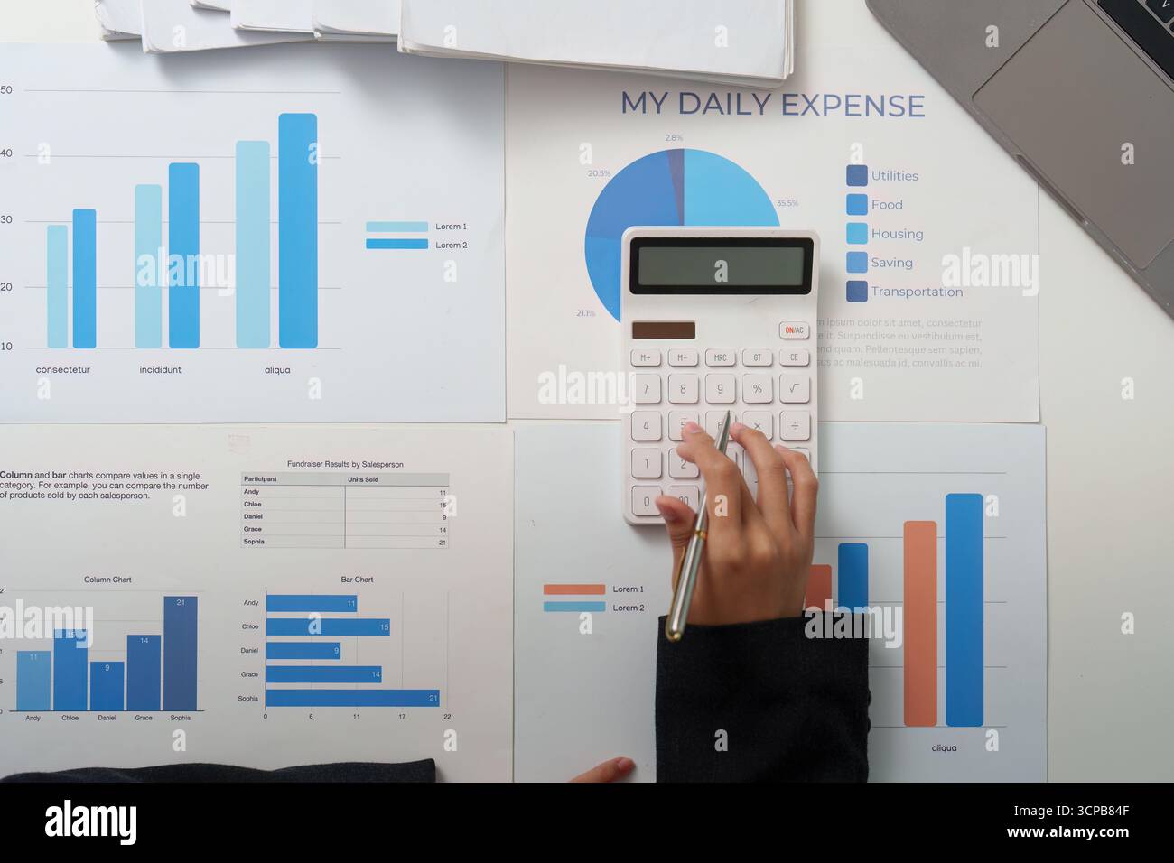 Daily Expense Management. Individual using calculator for daily expense ...