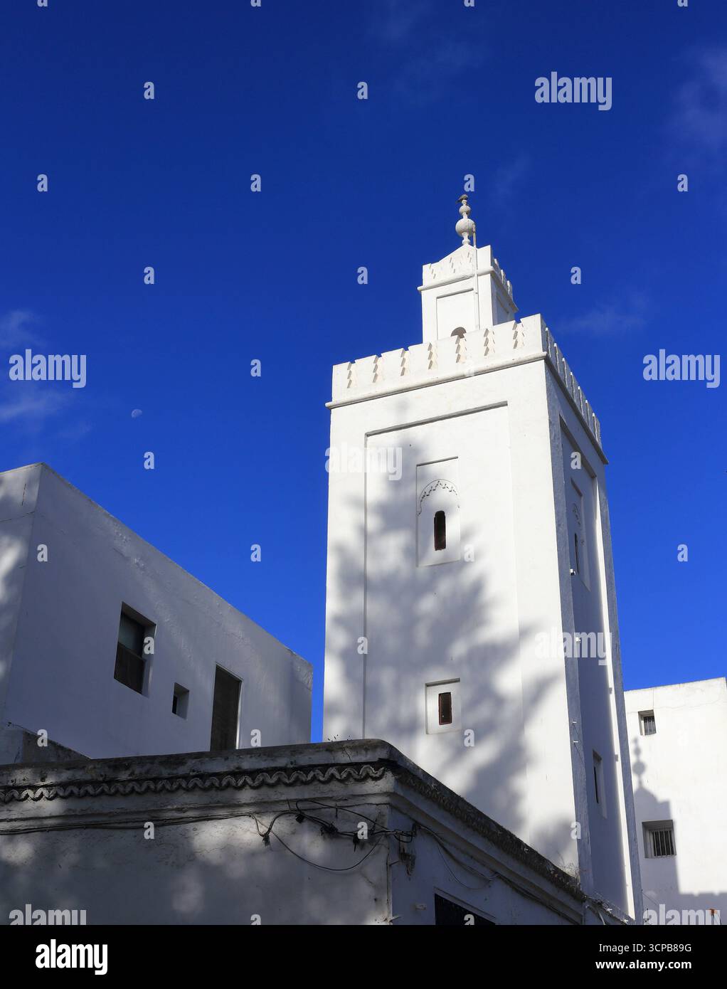 Casablanca, Morocco. A white washed mosque minaret in the historic ...