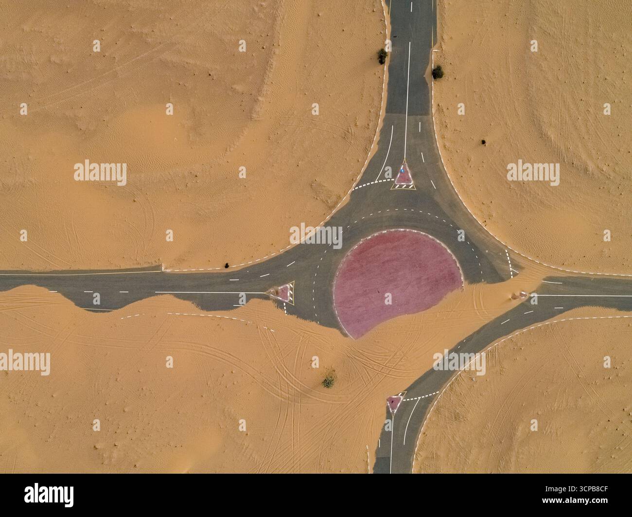 Aerial view of the roundabout with a red-colored center, surrounded by ...