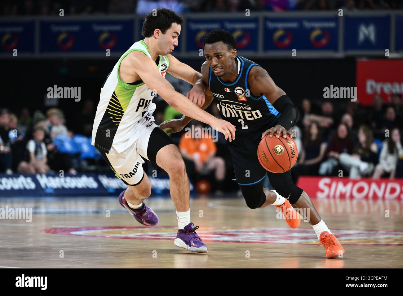 Owen Foxwell of the Phoenix (left) and Tyson Walker of Melbourne United ...