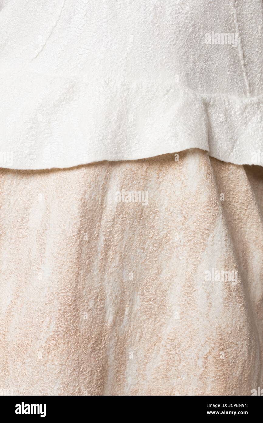 Soft textures of a minimalistic outfit captured in natural light during ...