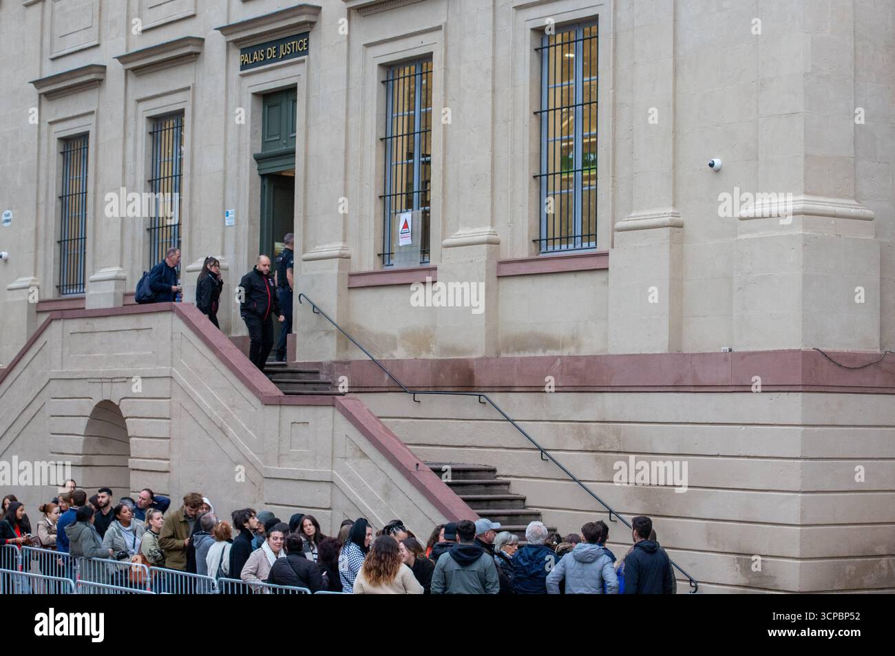 The public waiting outside the court for the fourth day of hearings, in ...