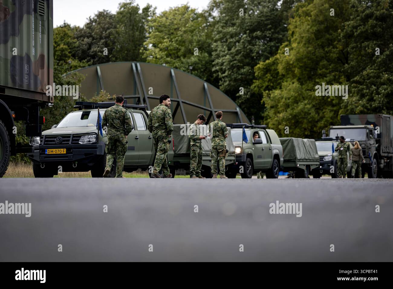 GILZE-RIJEN - Military vehicles carrying air force personnel from the ...