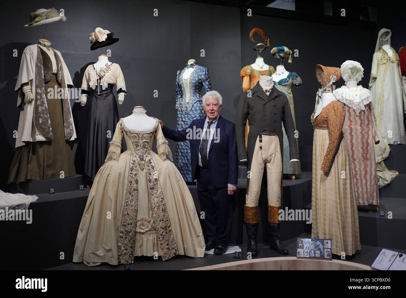 Oscar and Bafta winning costume designer John Bright poses next to ...